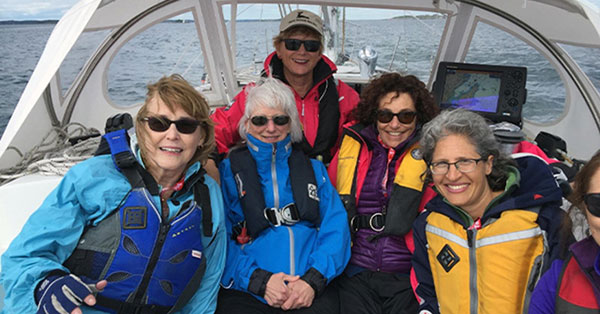 group-of-women-in-cockpit-of-sailboat.jpg